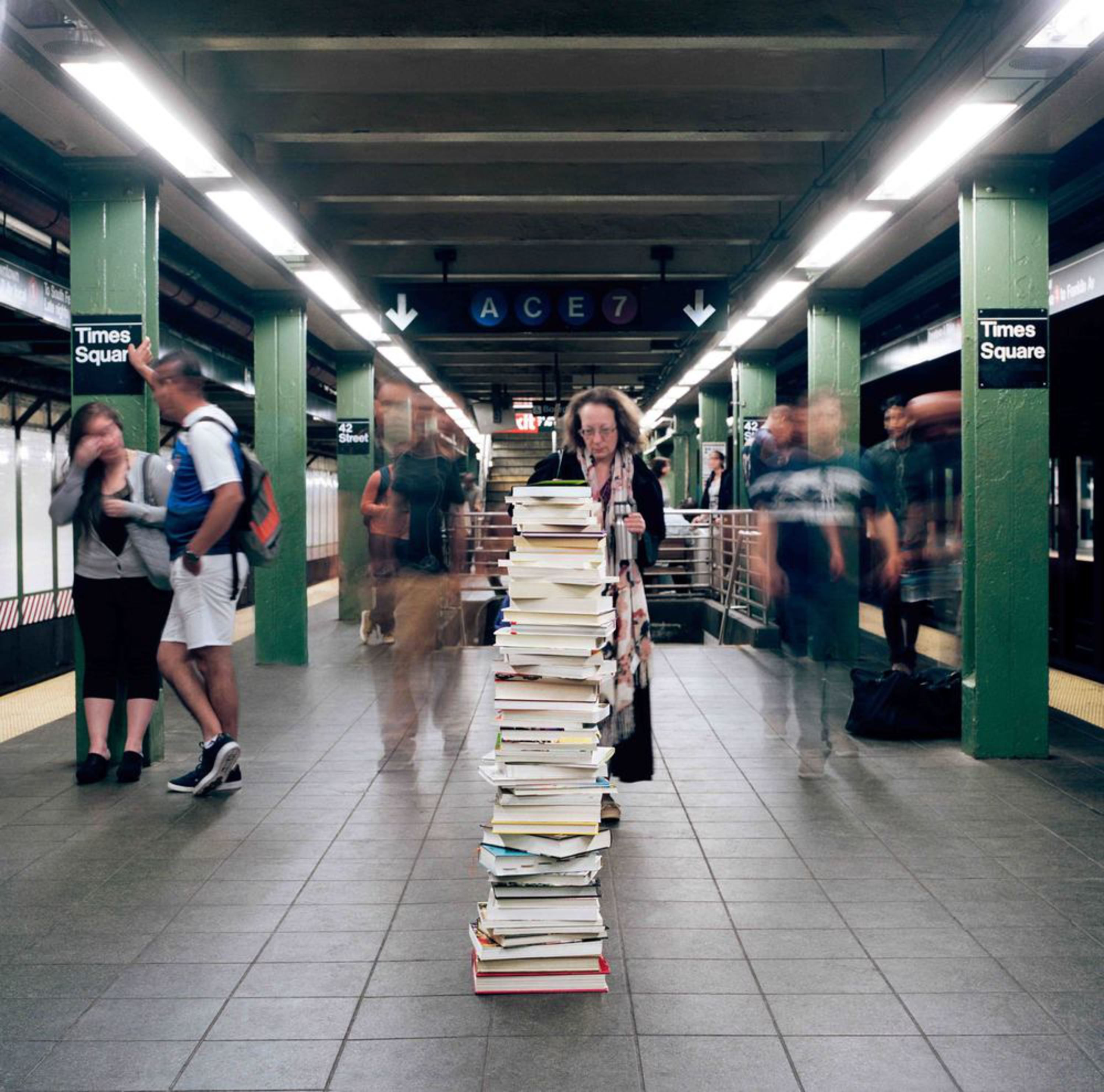Artist Leaves Stacks of Books All Around New York City for "The Reading ...
