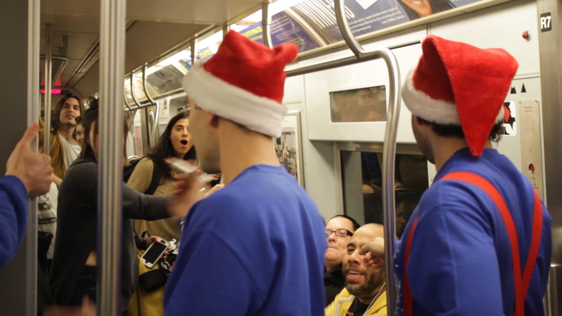 Between Brother Hits the Subway to Play Holiday Hangman for Prizes ...